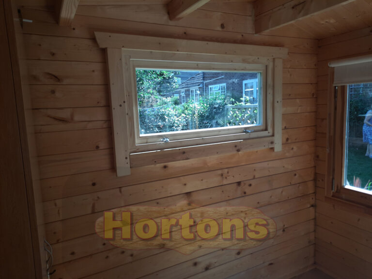Adding an extra window to your log cabin